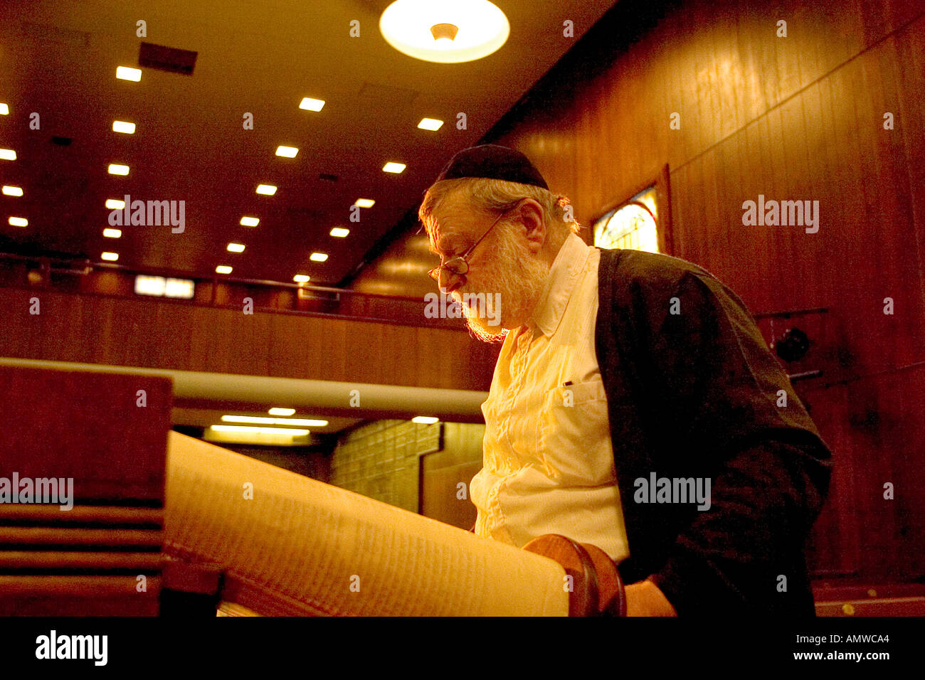 A rabbi appraising a Torah at the Actors Temple in Times Square New ...
