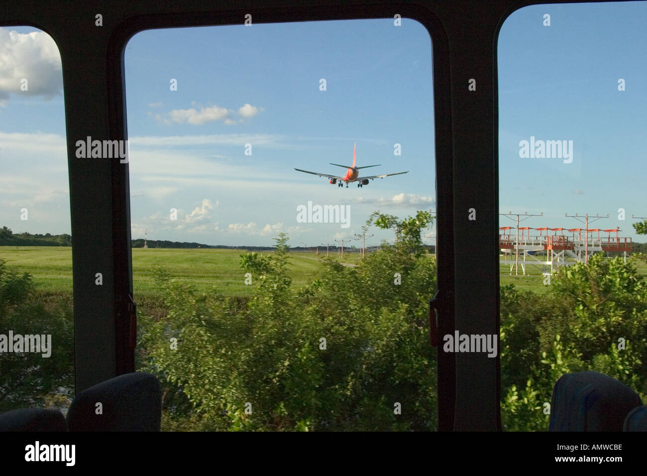 View of a plane taking off from Tampa Airport from inside a courtesy ...