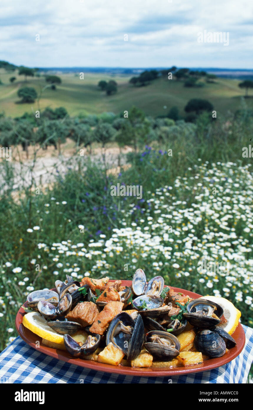 Pork and clams is a typical dish of the Alentejo Stock Photo - Alamy