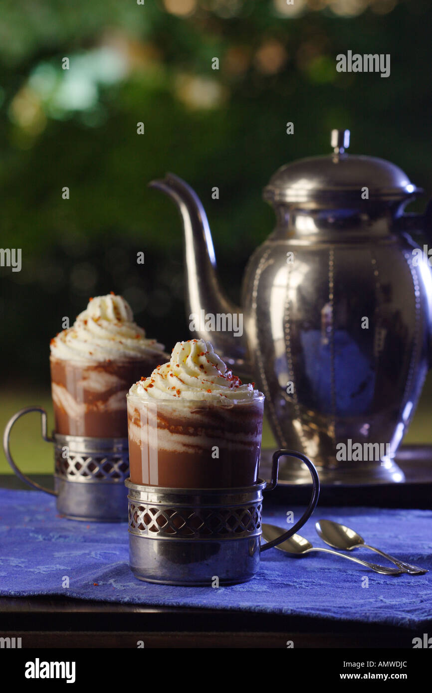 Hot chocolate with cream and chili flakes Stock Photo - Alamy