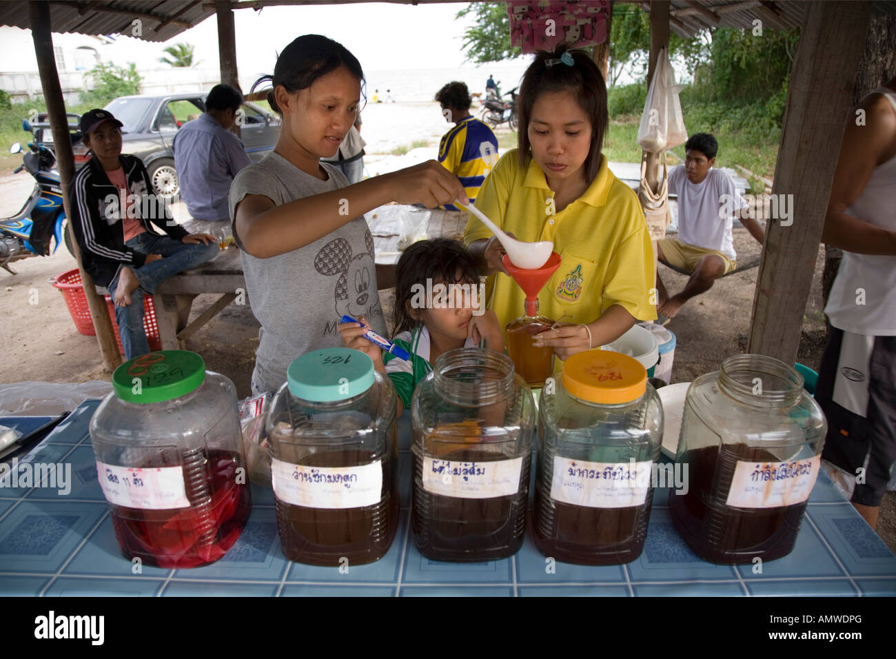 A road side stall selling an alcoholic drink of rum mixed with various ...