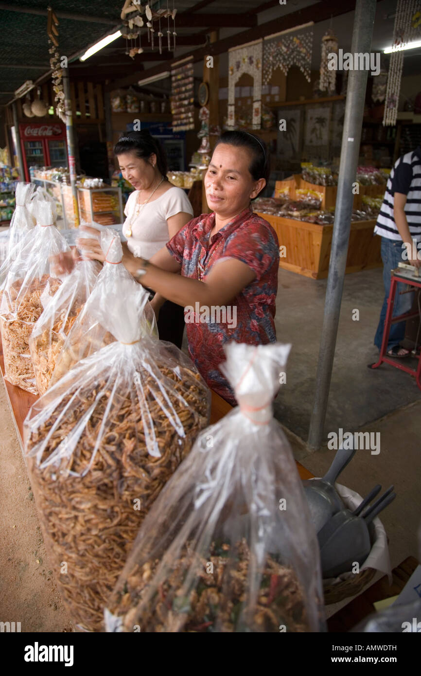 A road side stall selling dried fish and seafood snacks on the Phala ...