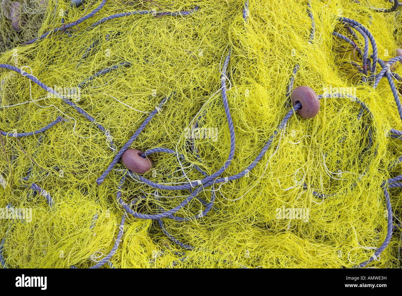 Yellow fishing net texture Stock Photo - Alamy