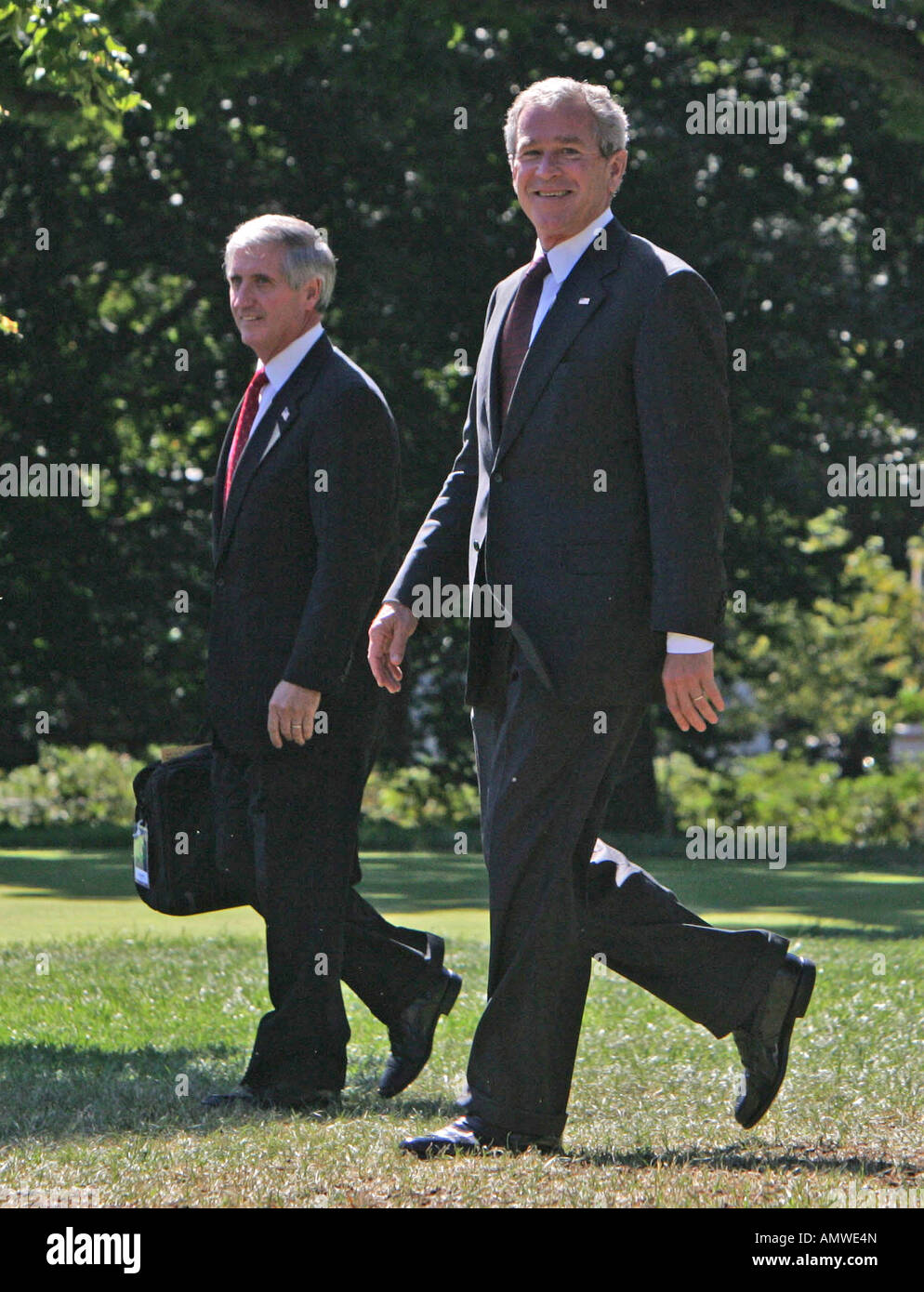 George W Bush and White House Chief of Staff Andrew Card walk from the ...