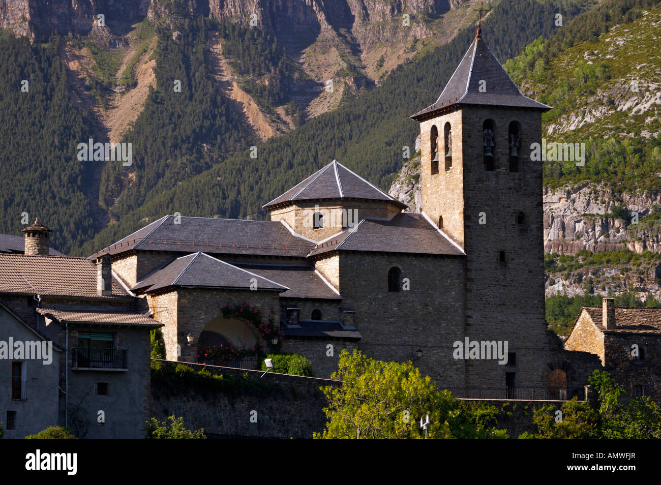 Village of Torla and the bell tower of the village church Iglesia de ...