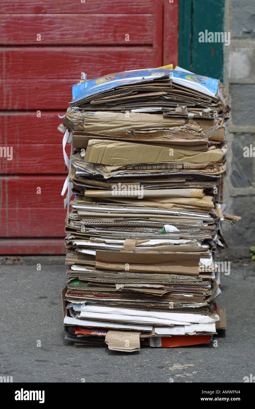 Waste cardboard bundle outside a commercial shop premises awaiting ...