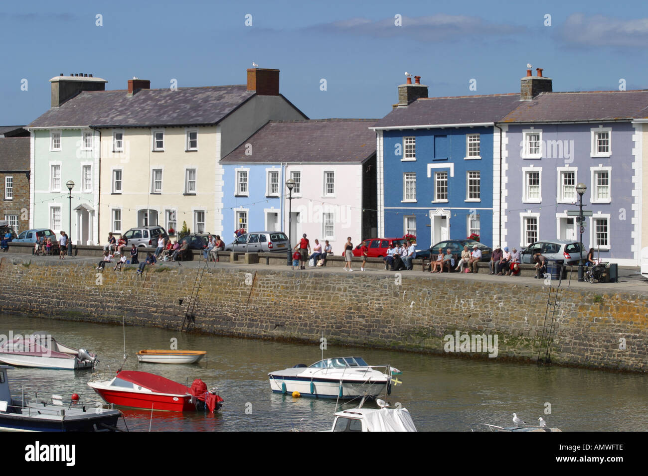 Aberaeron harbour Ceredigion West Wales tourists sitting around the ...