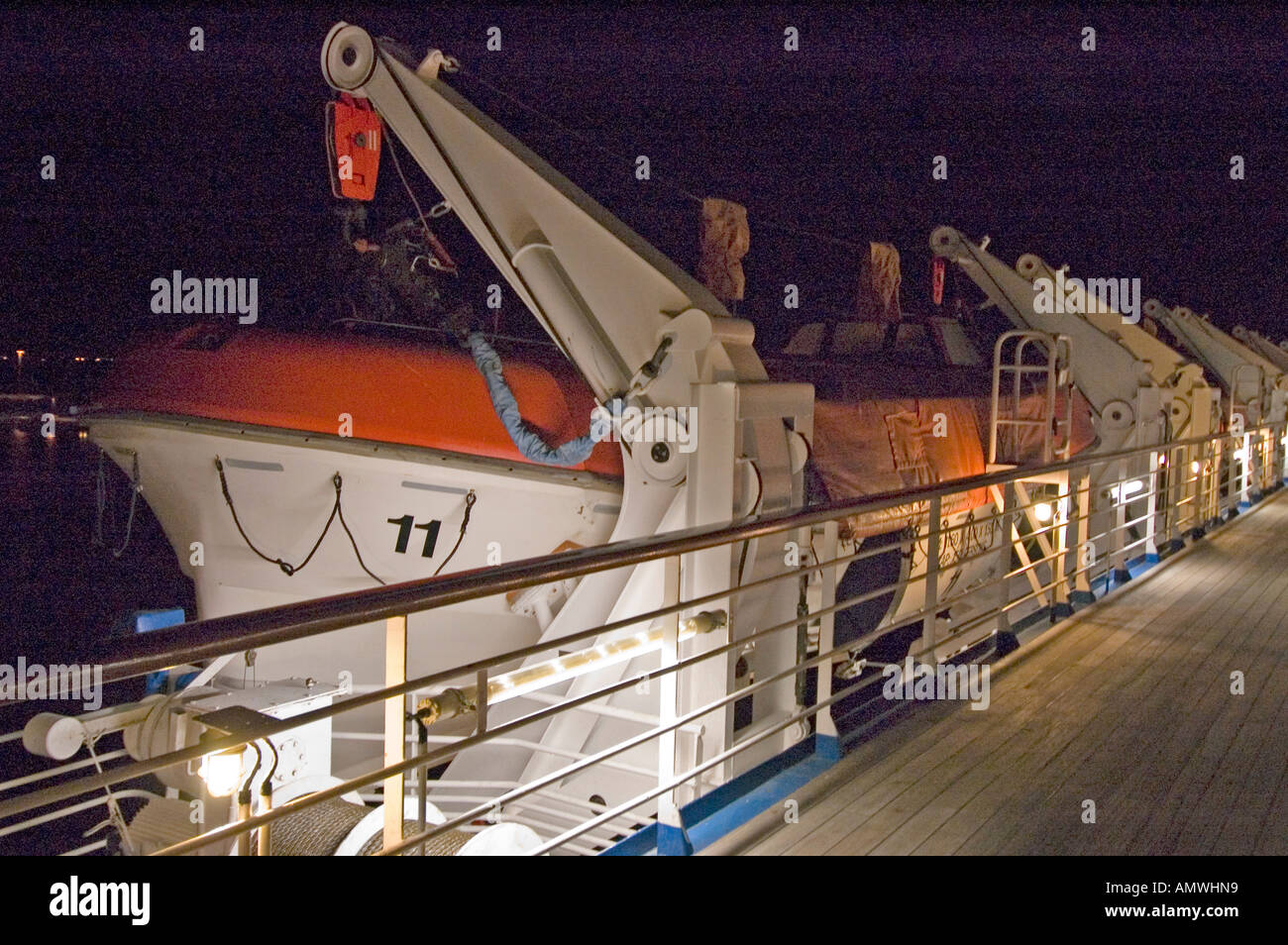 Cruise ship life boat lifeboat at night Stock Photo - Alamy