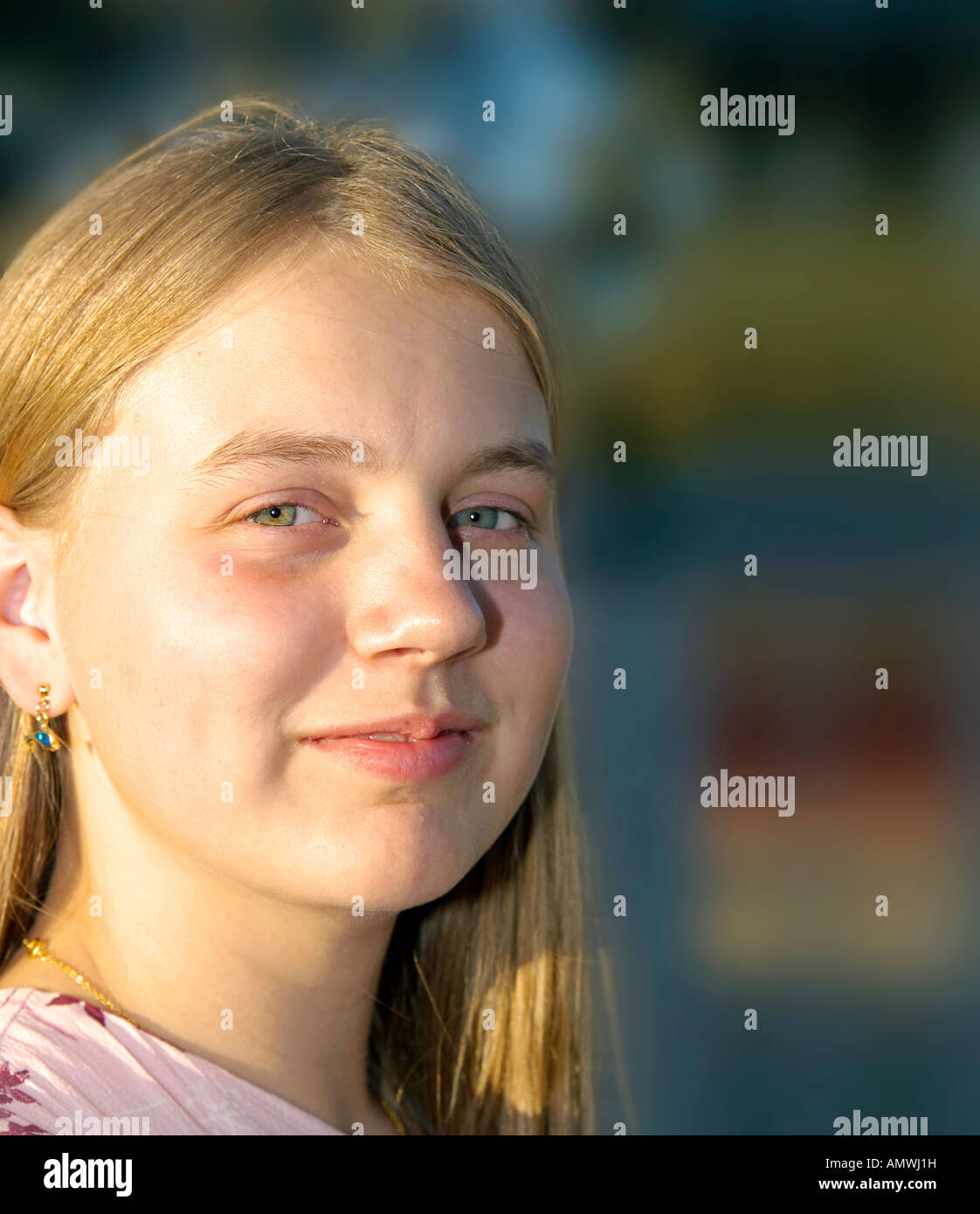 image of a teenage girl with amused smile Stock Photo - Alamy