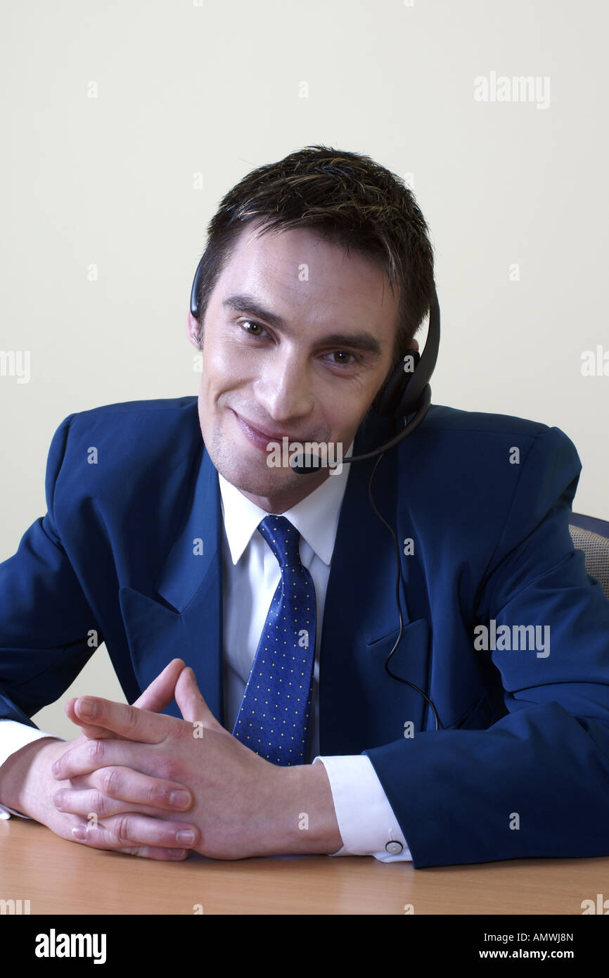 smiling telesales worker Stock Photo - Alamy