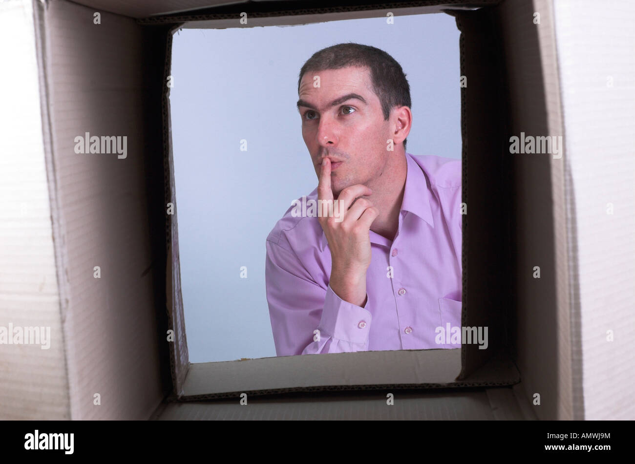 Thinking outside of the box Stock Photo - Alamy
