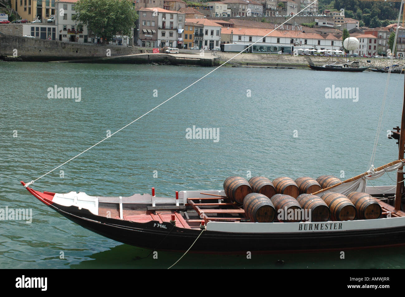 Traditional rabelos boat laden with Port wine barrels and storage caves ...
