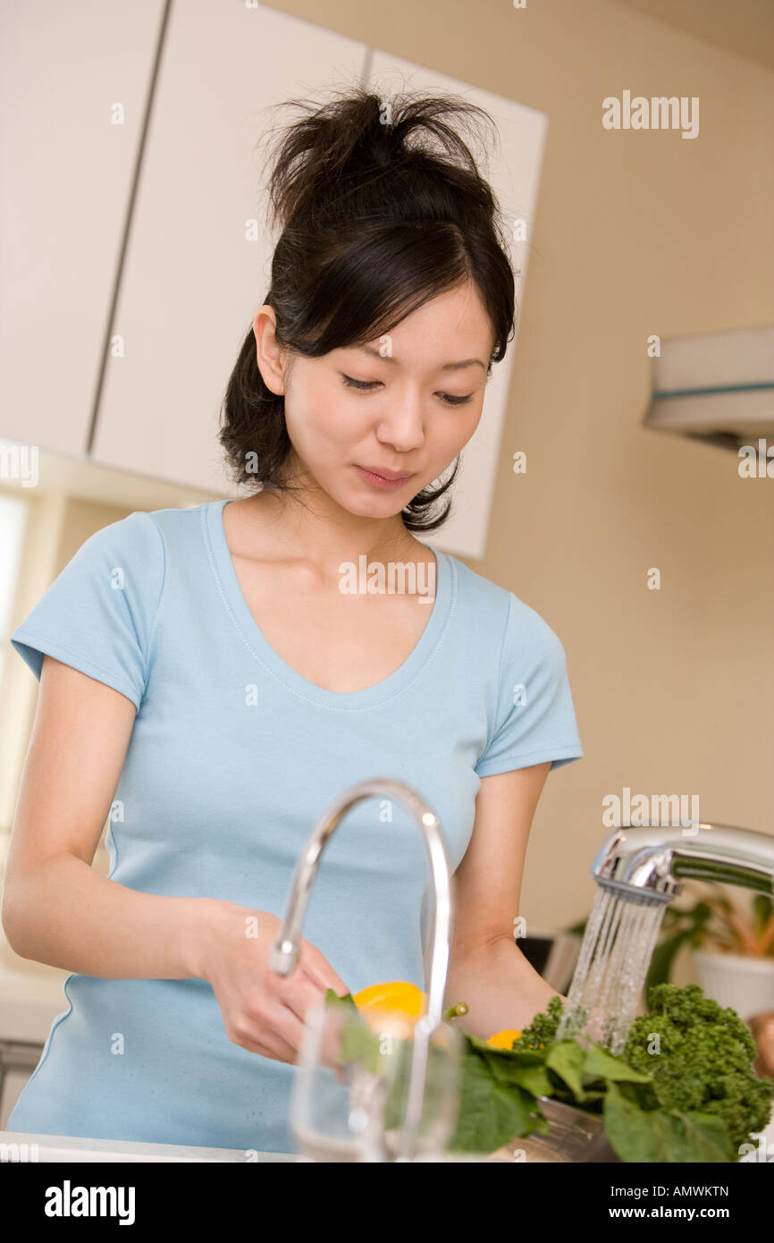 Scene of woman cooking Stock Photo - Alamy