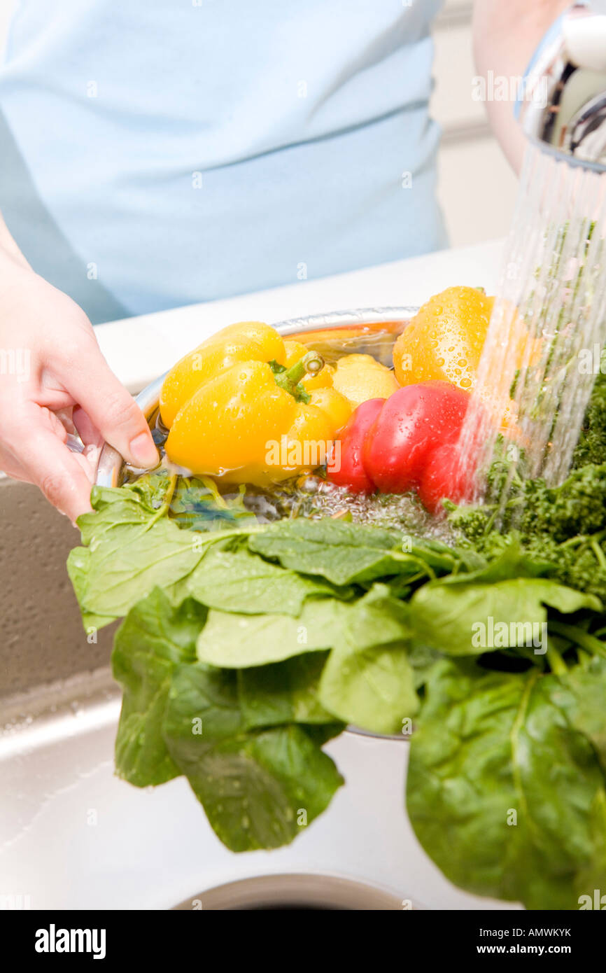 Hands washing vegetable Stock Photo - Alamy