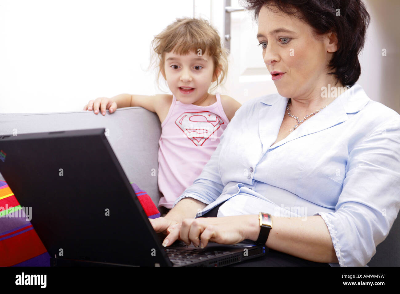 Woman watching over children hi-res stock photography and images - Alamy