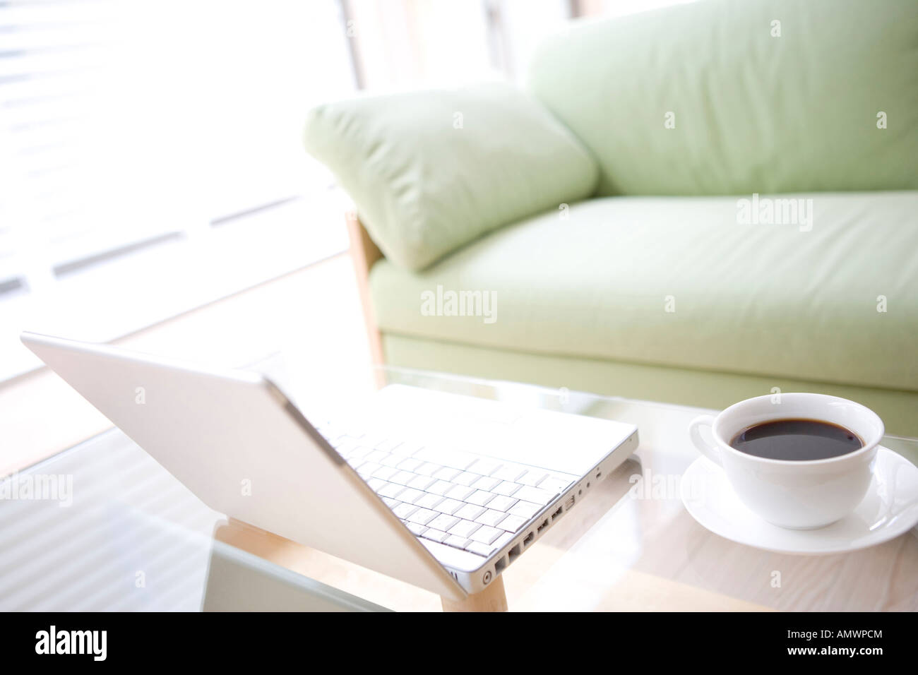Laptop PC and sofa Stock Photo - Alamy