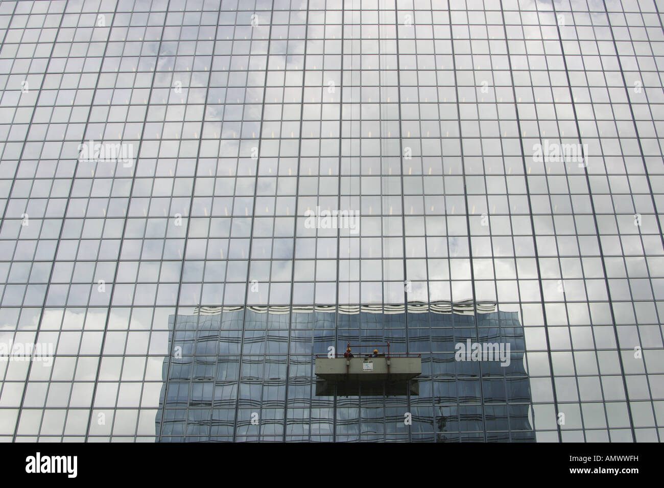 window cleaner on gass cladding, Belgium, Bruessel Stock Photo - Alamy