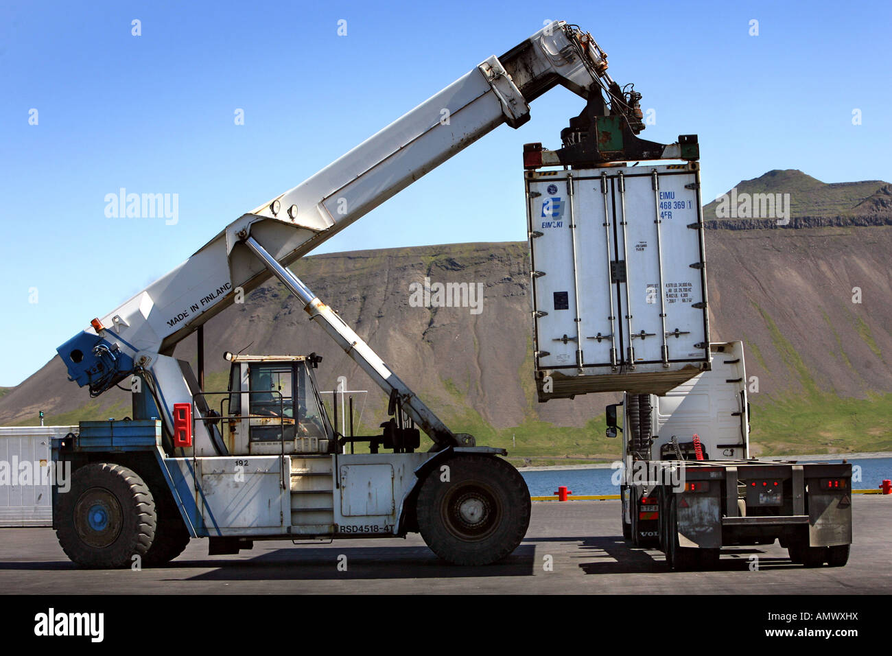 Loading containers in Grundarfjordur, Iceland Stock Photo - Alamy