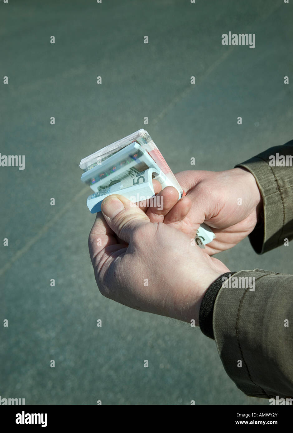 Man with euro hi-res stock photography and images - Alamy