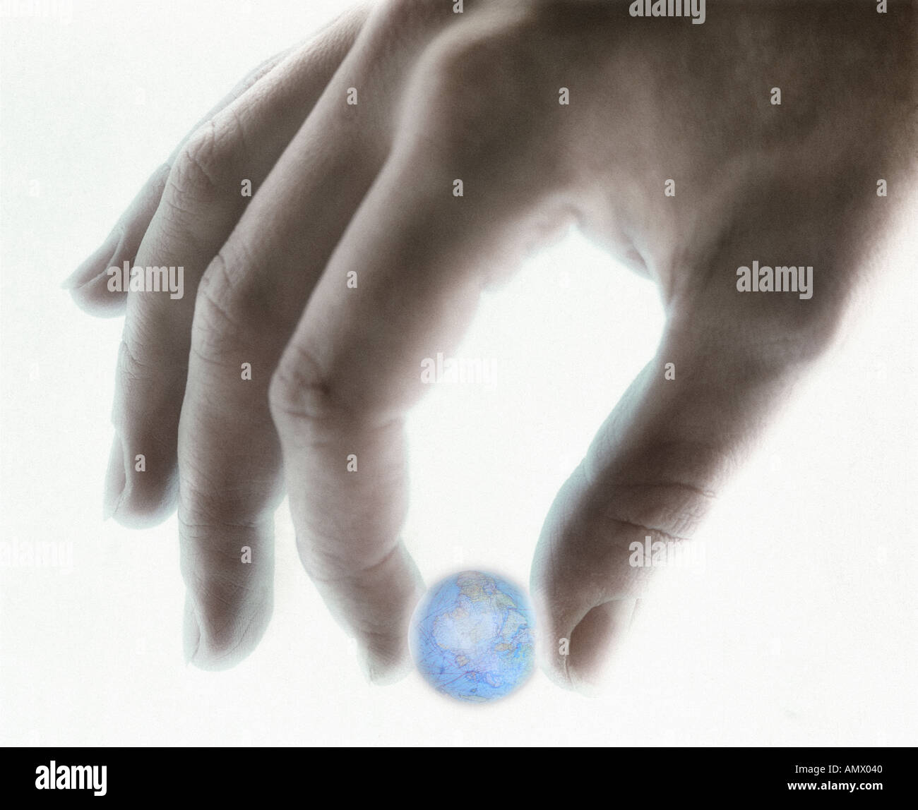 Hand With Globe Stock Photo - Alamy