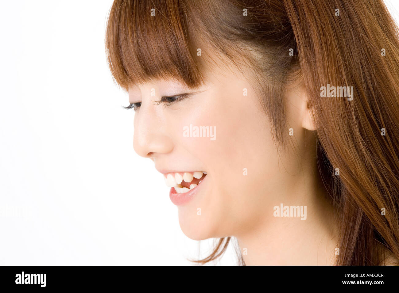 Smiling Japanese woman Stock Photo - Alamy