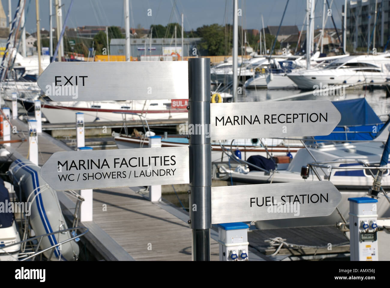 Signpost in a yacht marina Stock Photo - Alamy