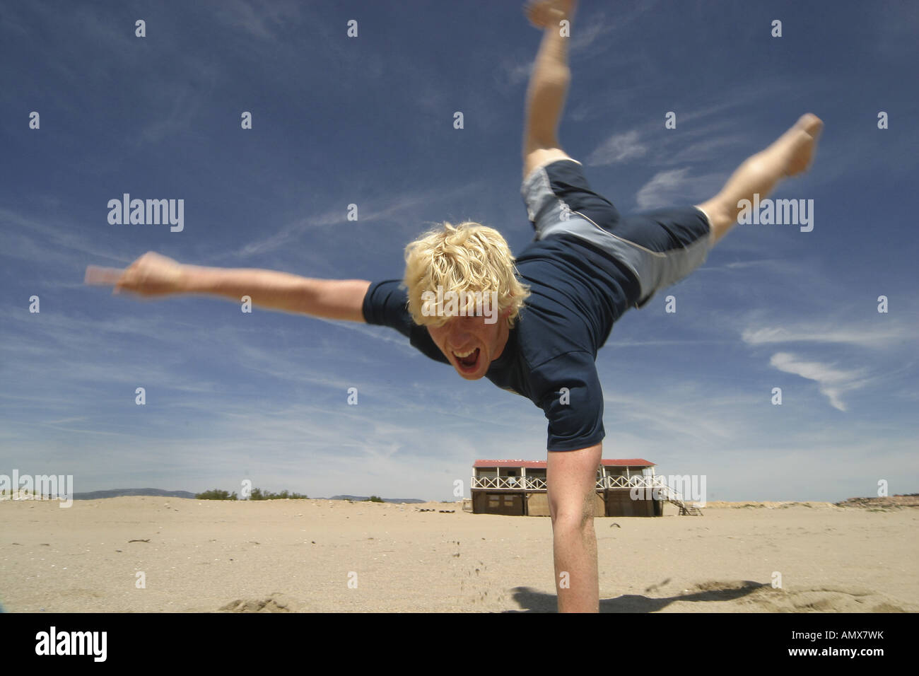 Man doing a handstand hi-res stock photography and images - Alamy