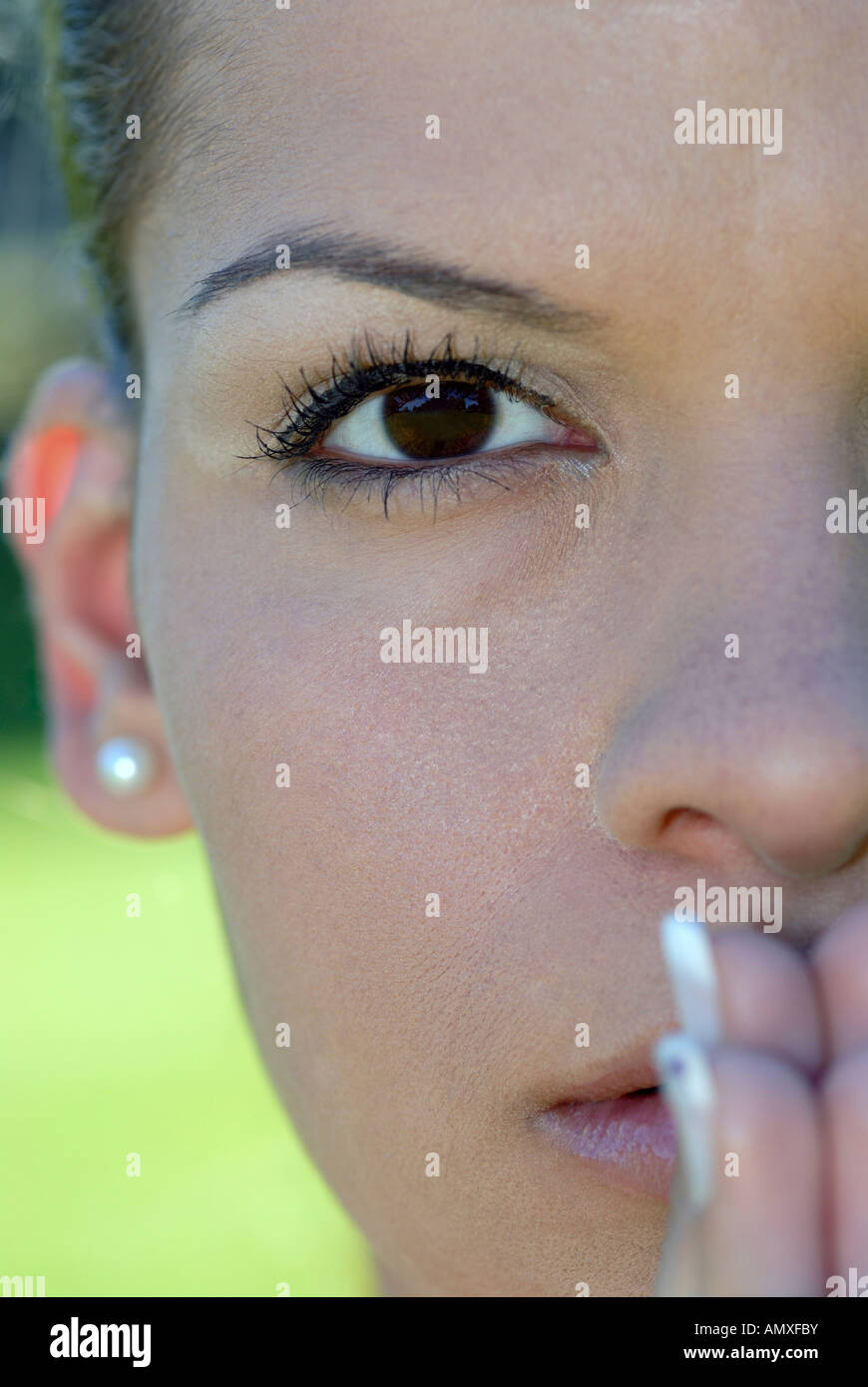Woman folding her hands Stock Photo - Alamy