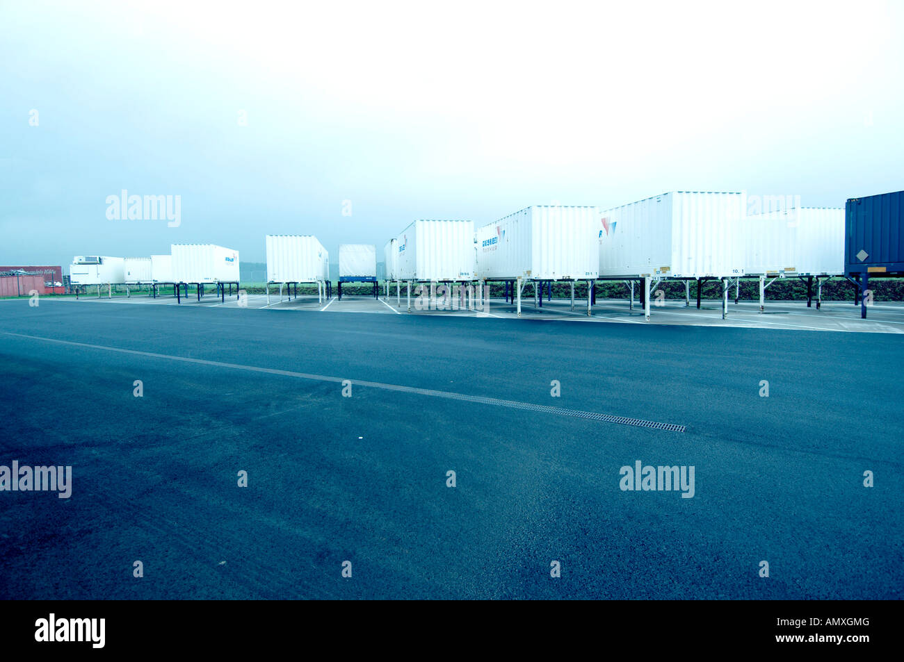 Cargo containers in parking lot, Rhineland, Germany Stock Photo - Alamy