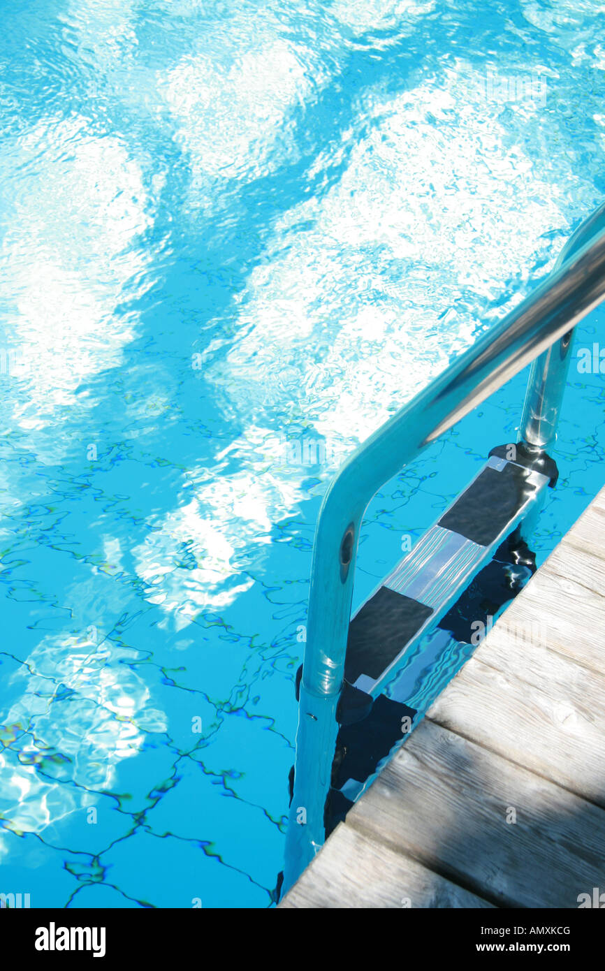 High angle view of ladder in swimming pool Stock Photo - Alamy