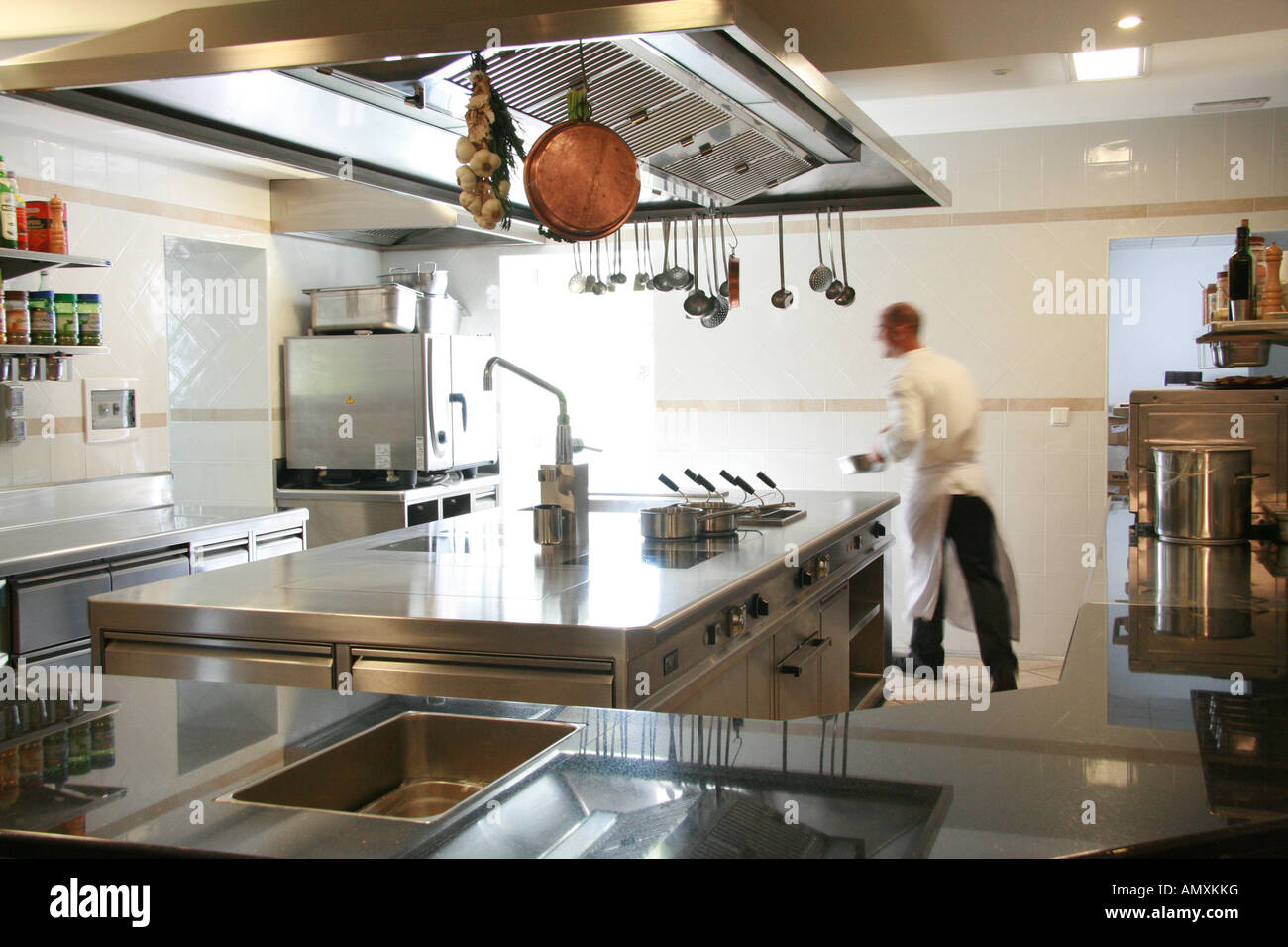 Side profile of chef in kitchen Stock Photo - Alamy