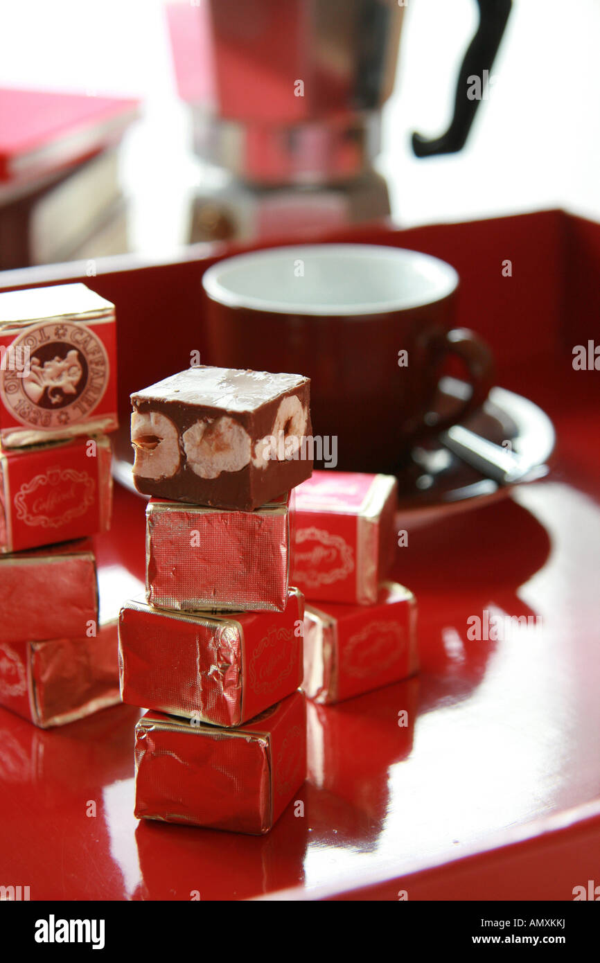Stacks of wrapped chocolate cubes Stock Photo - Alamy