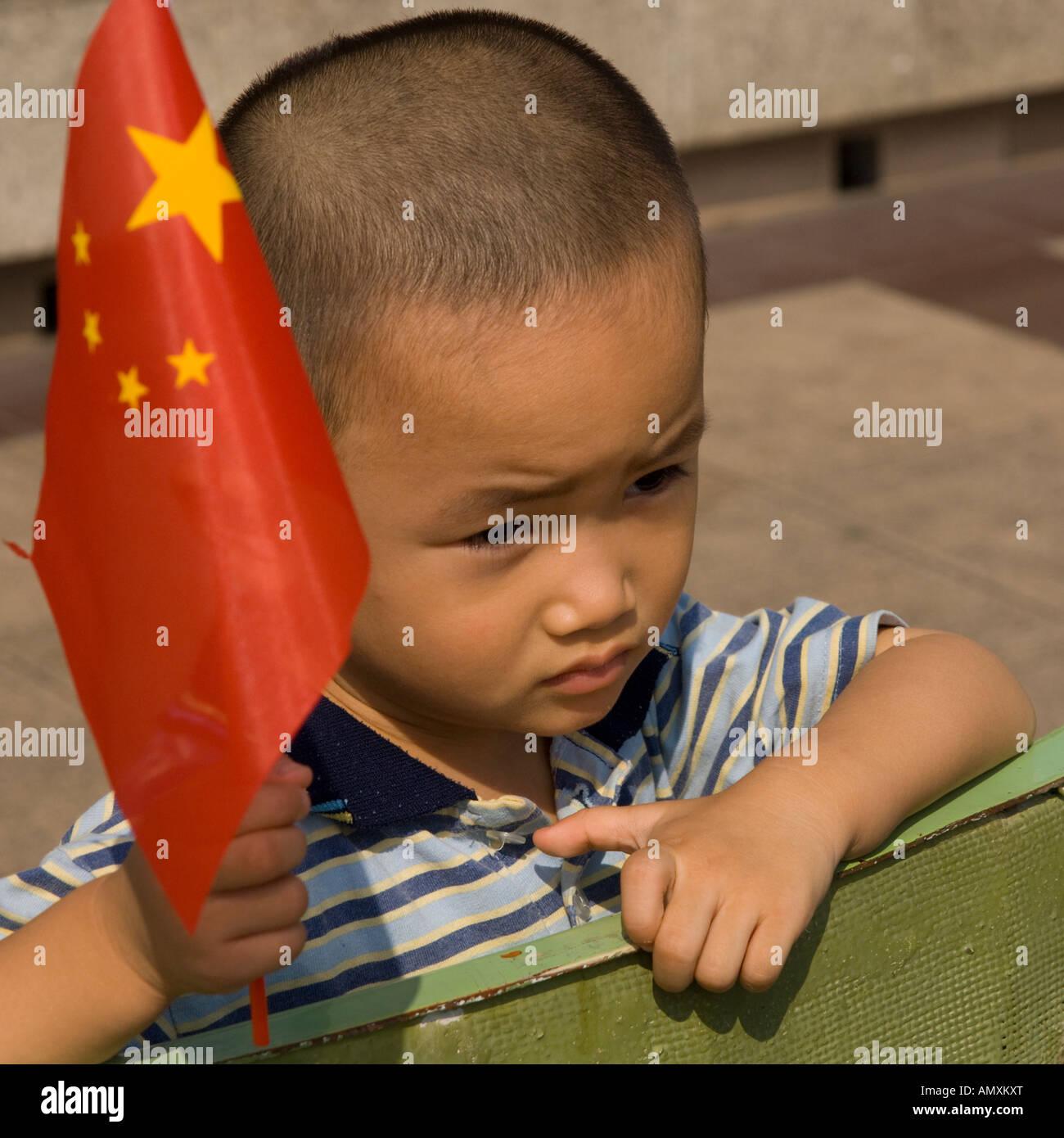 China Shanghai The Bund Waitan portrait of a chineese boy holding a ...