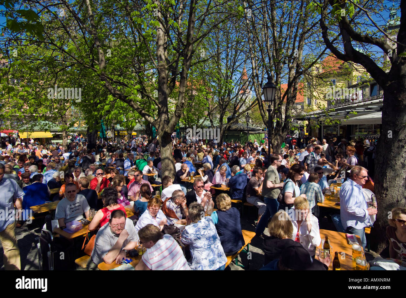 Group of people sitting at beer garden Munich Bavaria Germany Stock ...