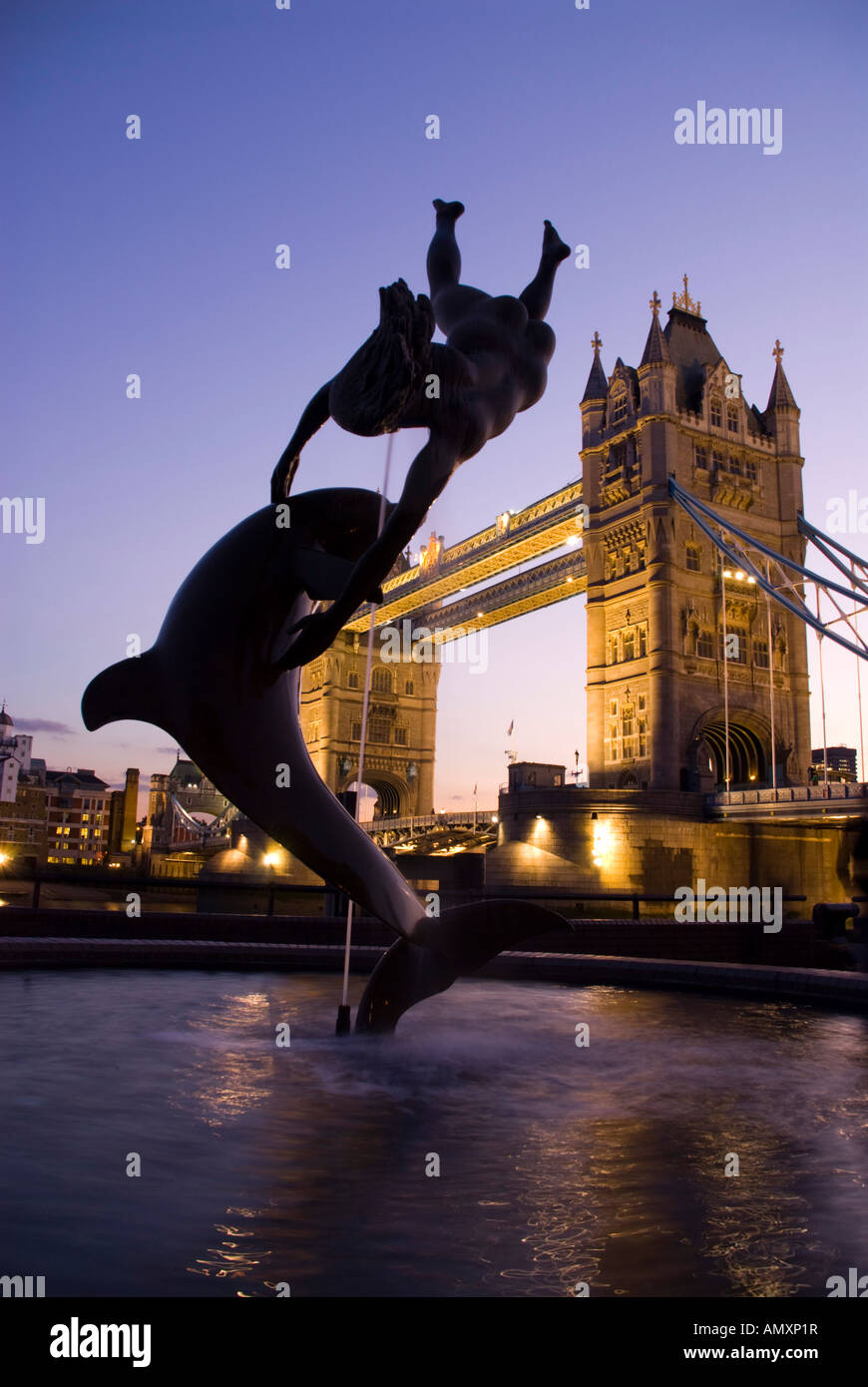 Fountain with bridge in background, Tower Bridge, Thames River, London ...