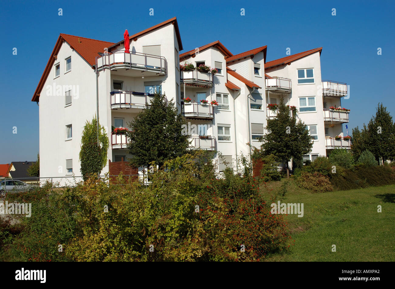 New building settlement with a family and terraced houses Stock Photo ...
