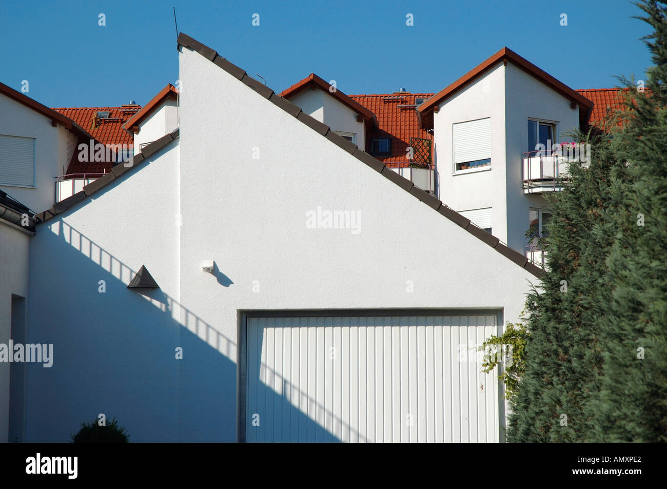 New building settlement with a family and terraced houses Stock Photo ...