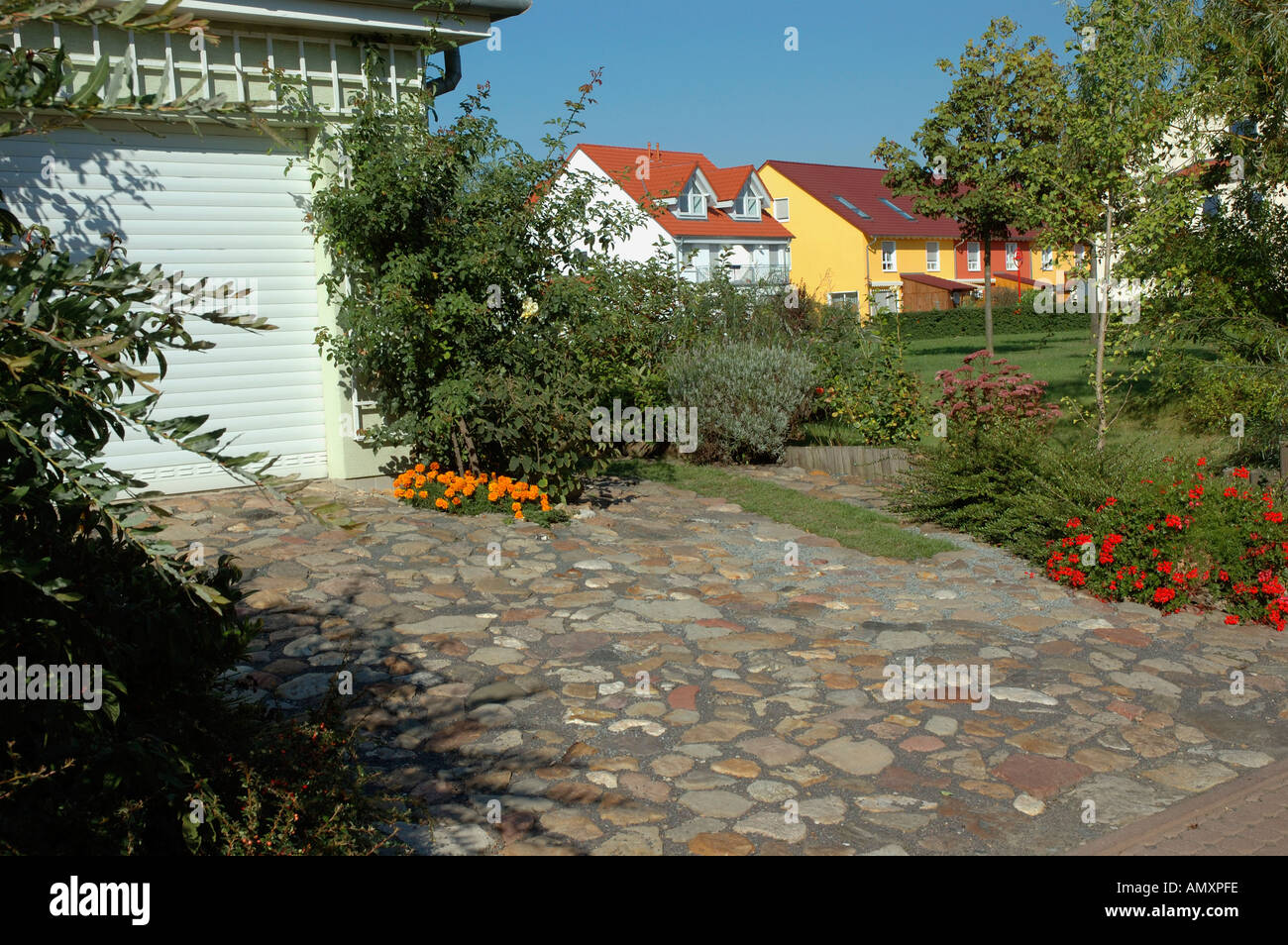 New building settlement with a family and terraced houses Stock Photo ...