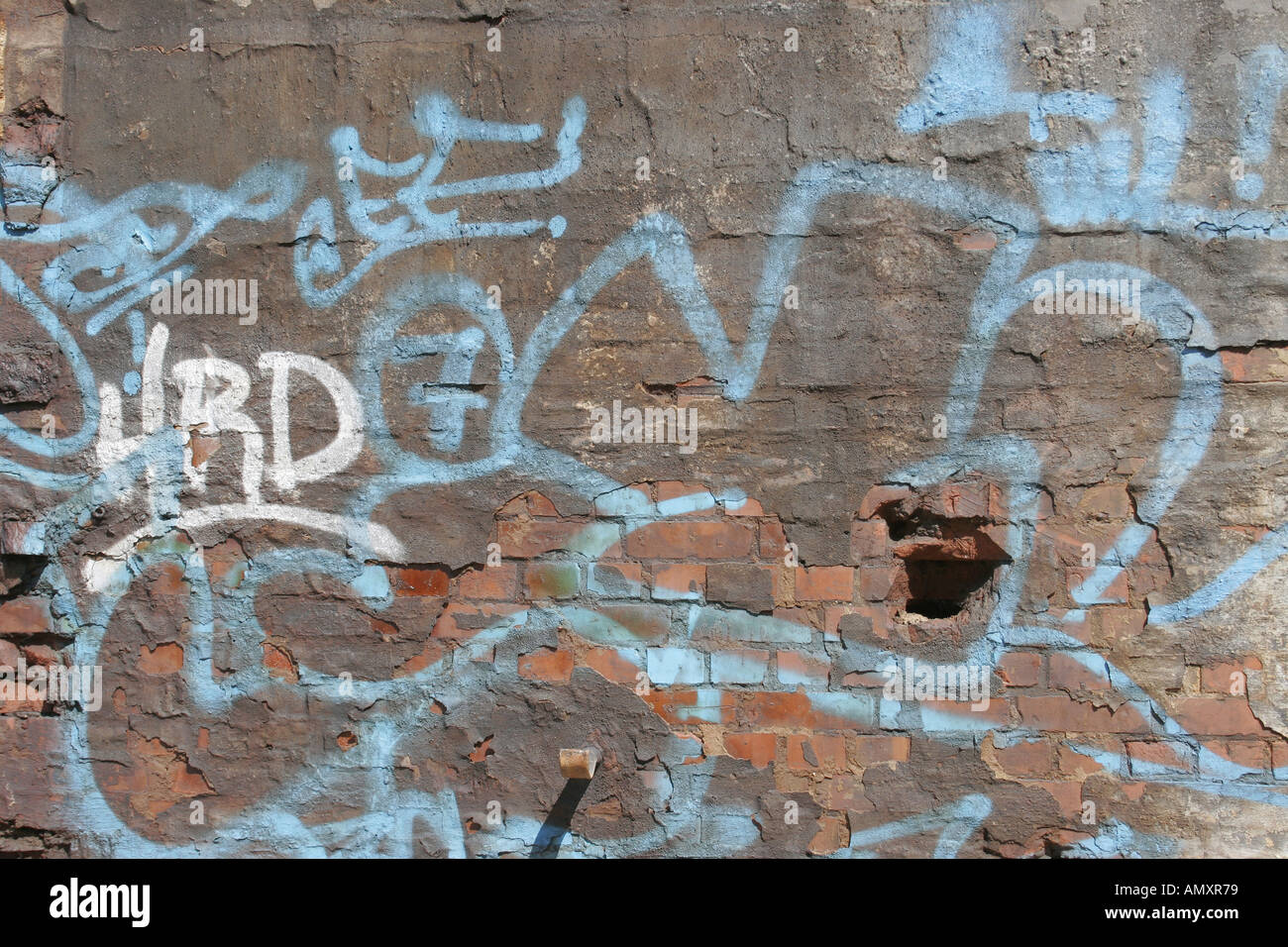 Illegal Graffitis at a wall in Leipzig Stock Photo - Alamy