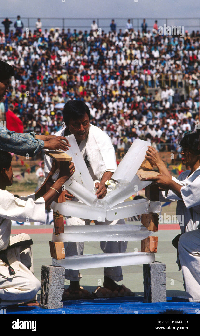 Breaking ice karate chop international hi-res stock photography and ...