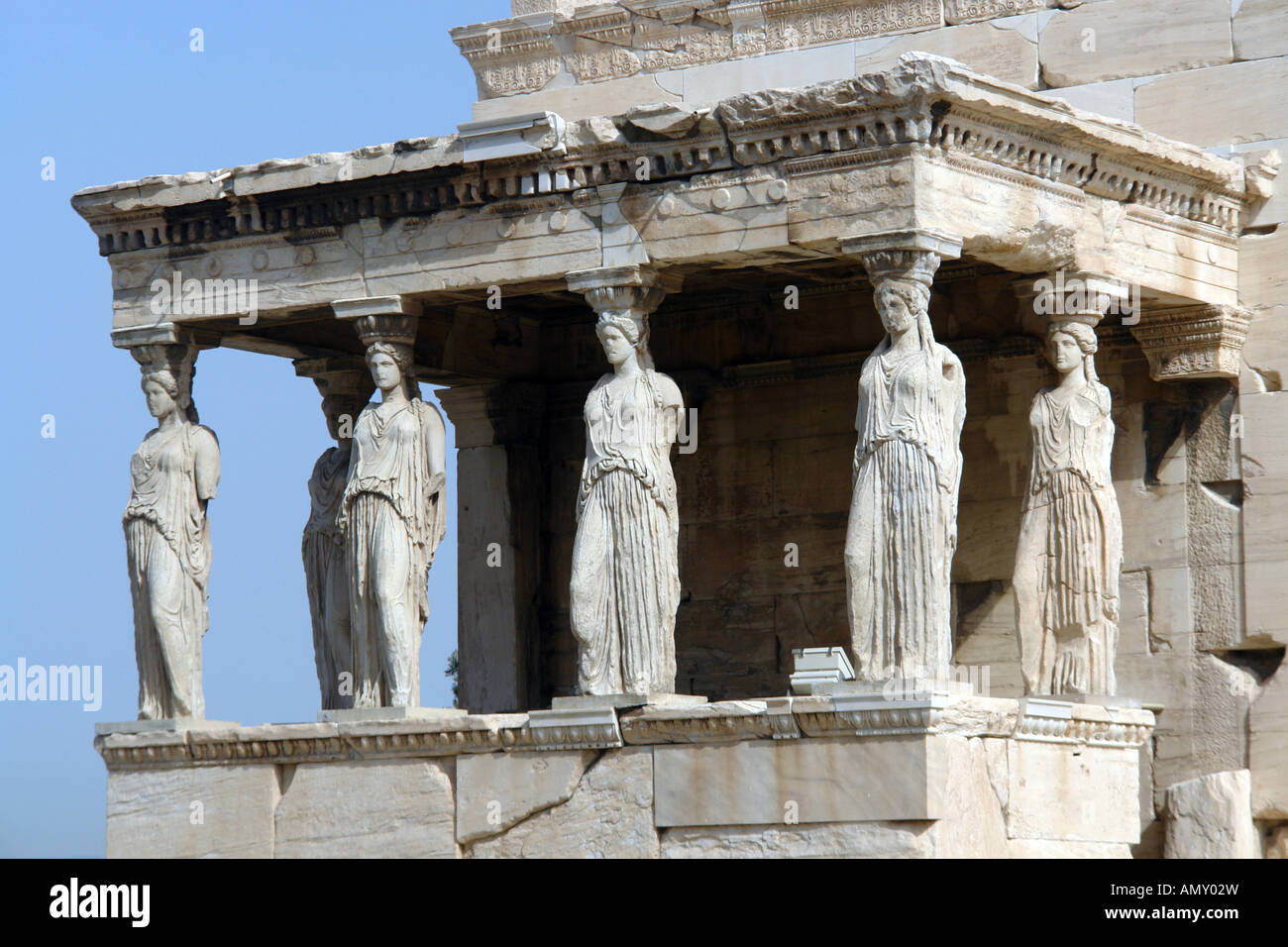 Ancient building against clear blue sky, Erechtheion, Acropolis, Athens ...