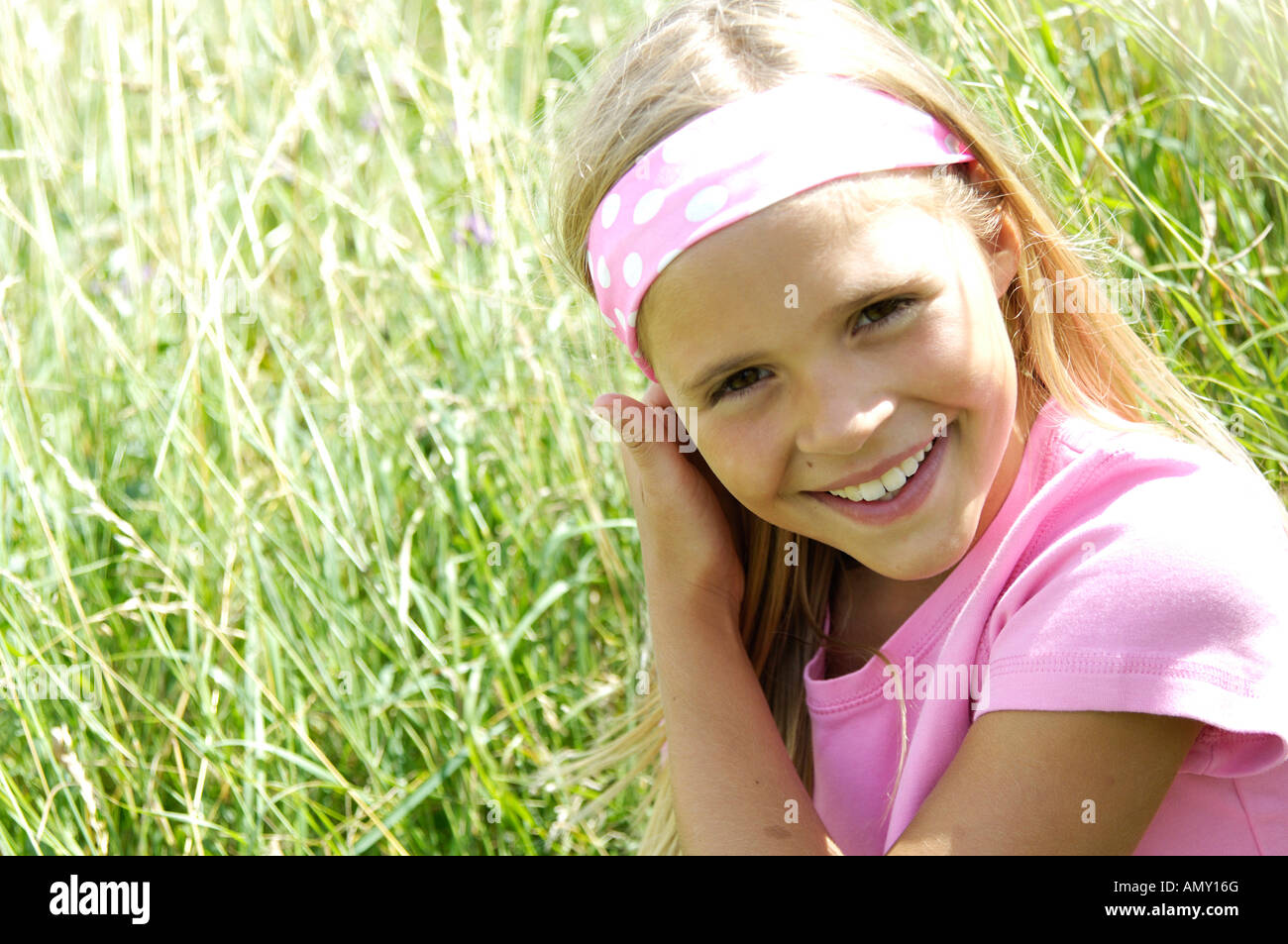 Portrait of girl smiling Stock Photo - Alamy