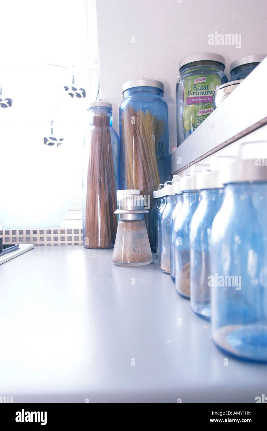 Row of jars of spices in kitchen Stock Photo - Alamy