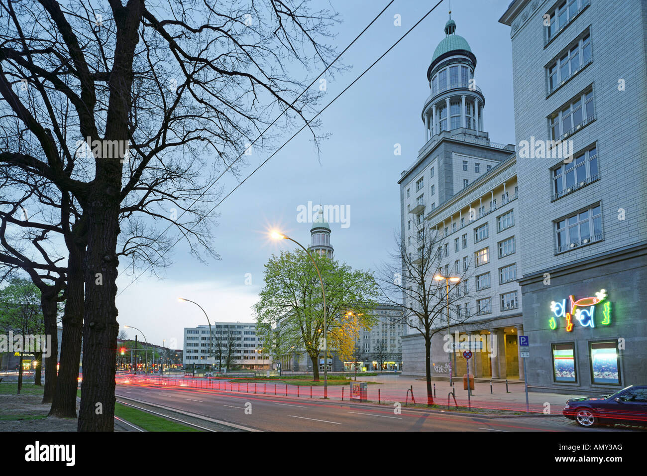 Trees in front of buildings in city, Frankfurter Tor, Friedrichshain ...