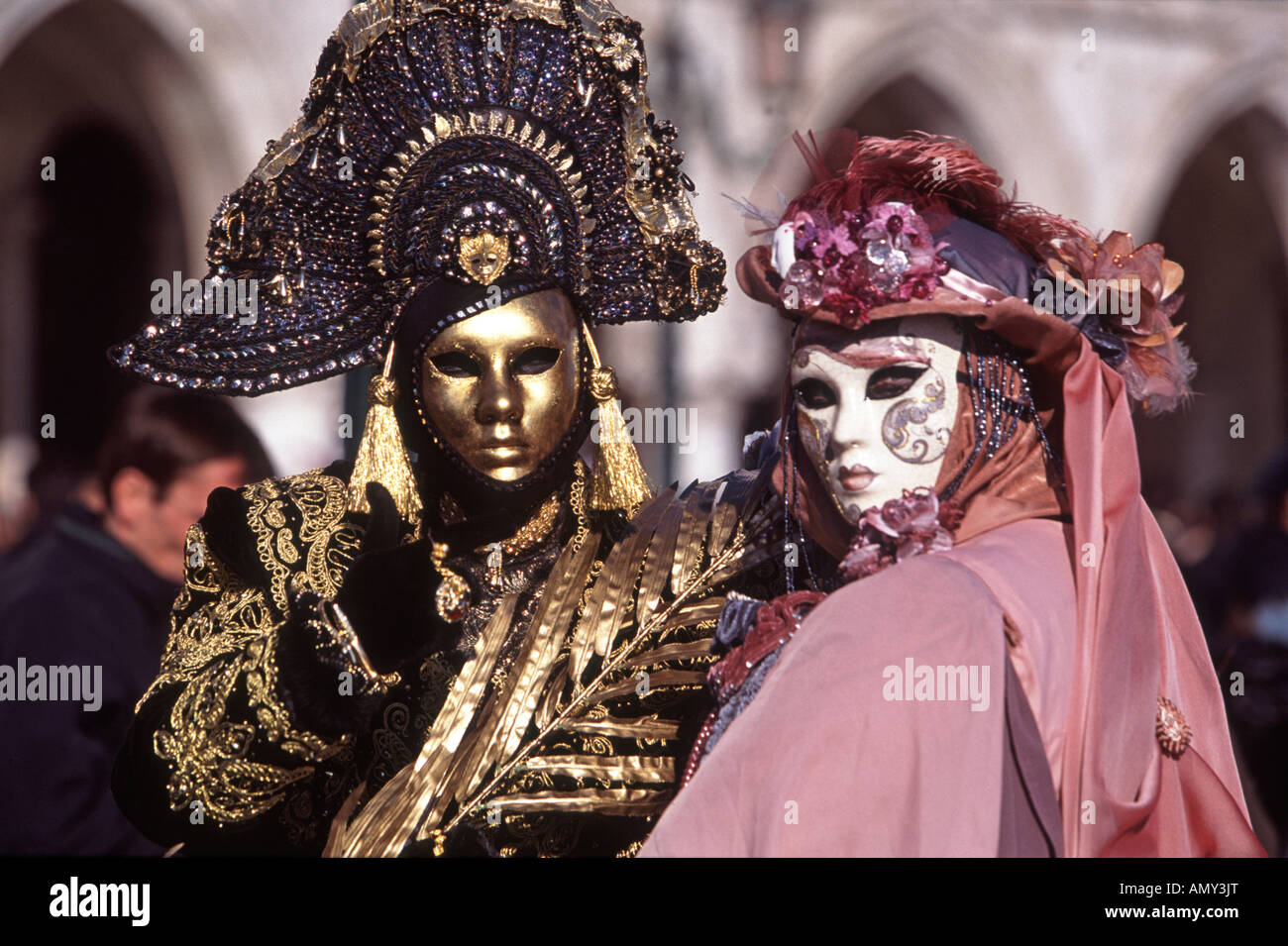 Pair of masked characters Venice carnival Italy Stock Photo - Alamy