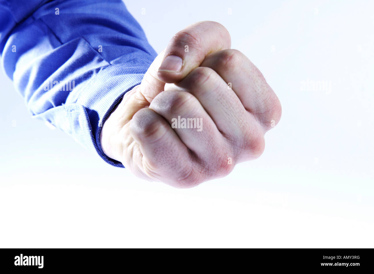 Close up man clenching fist hi-res stock photography and images - Alamy