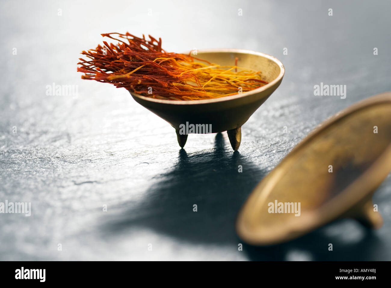 saffron in a bowl, close-up Stock Photo - Alamy