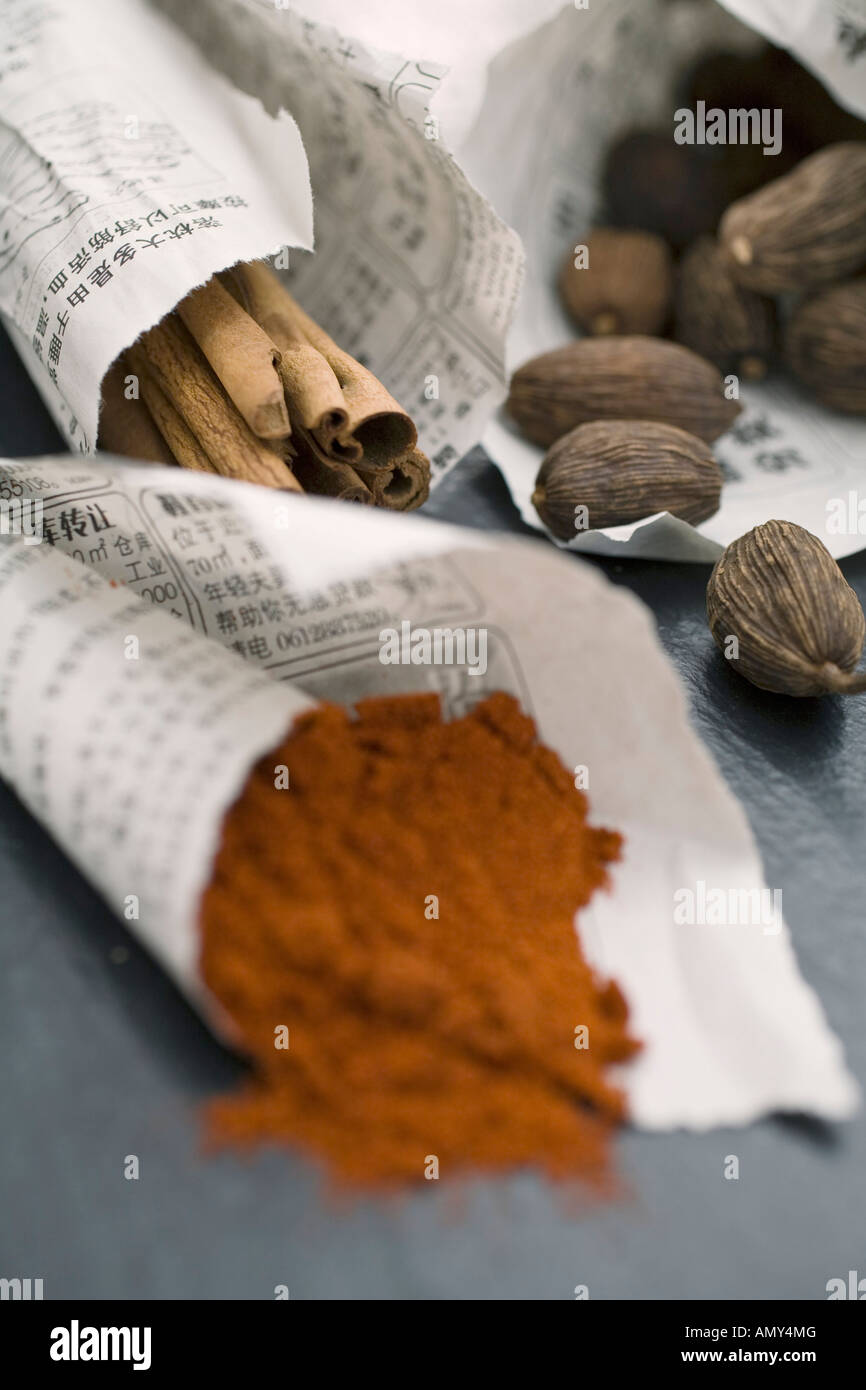 Close-up of cone with red chilli powder falling out Stock Photo - Alamy