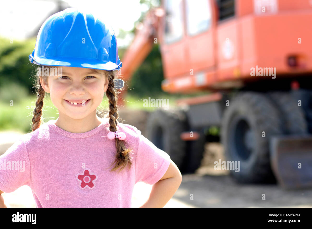 Girl wearing blue helmet Stock Photo - Alamy