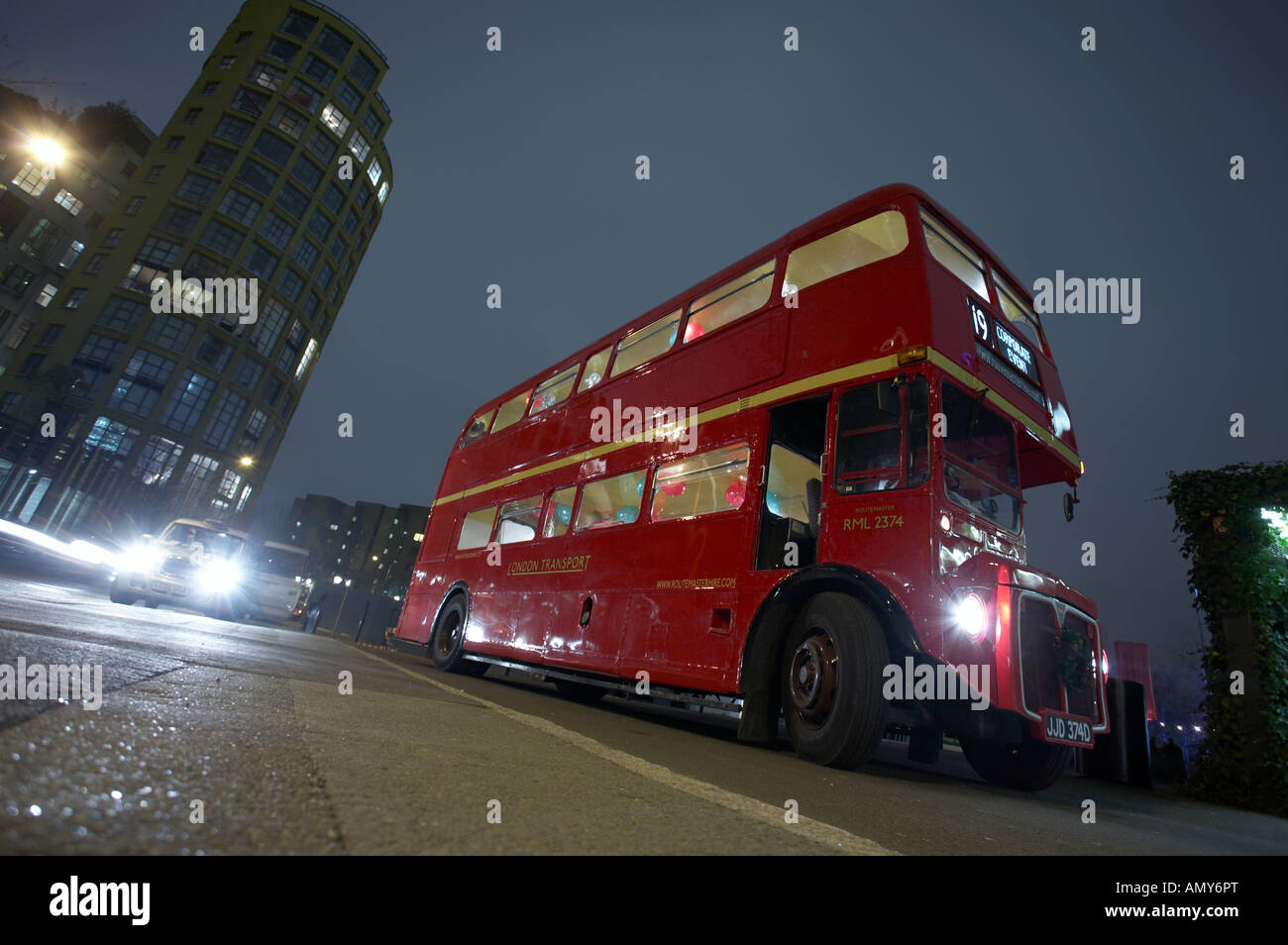 classic red doubledecker London Routemaster bus at night in London ...